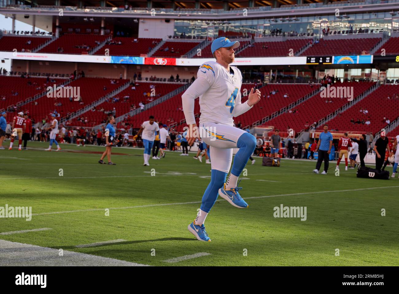 Los Angeles Chargers place kicker Dustin Hopkins (4) warms up during an ...