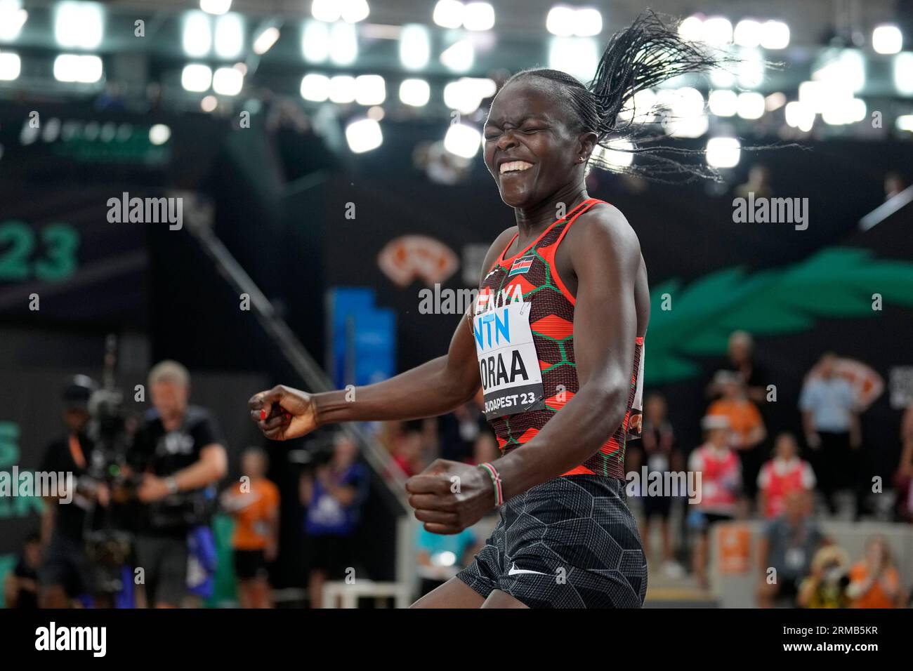 Mary Moraa, of Kenya, celebrates after winning the gold medal in the ...