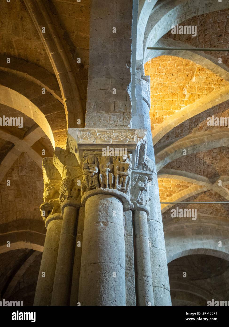 Biblical scene decorating the chapiter of a column in Sovana Cathedral ...