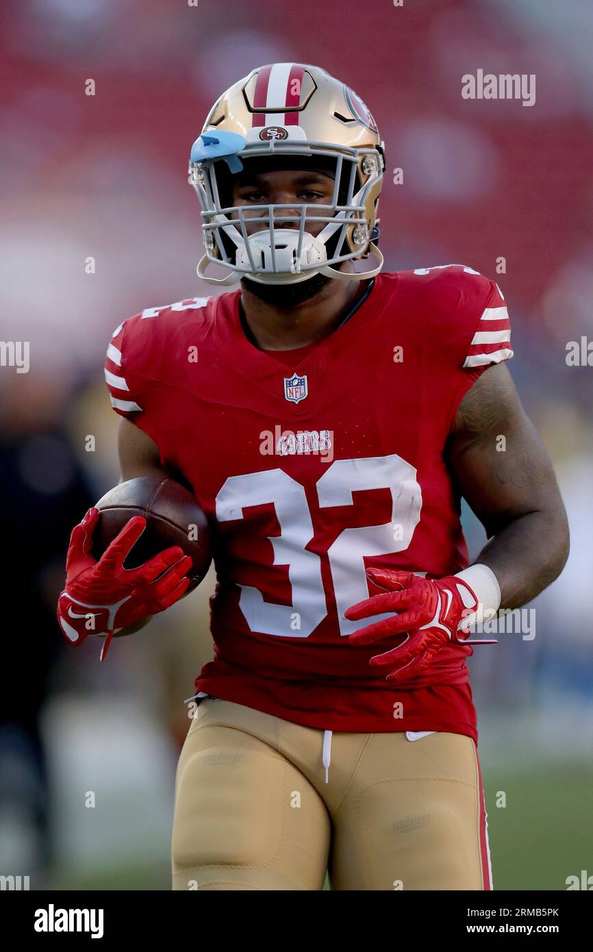 San Francisco 49ers running back Tyrion Davis-Price (32) warms up ...