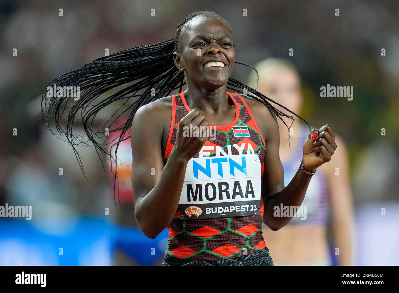 Mary Moraa, of Kenya celebrates after winning the final of the Women's ...