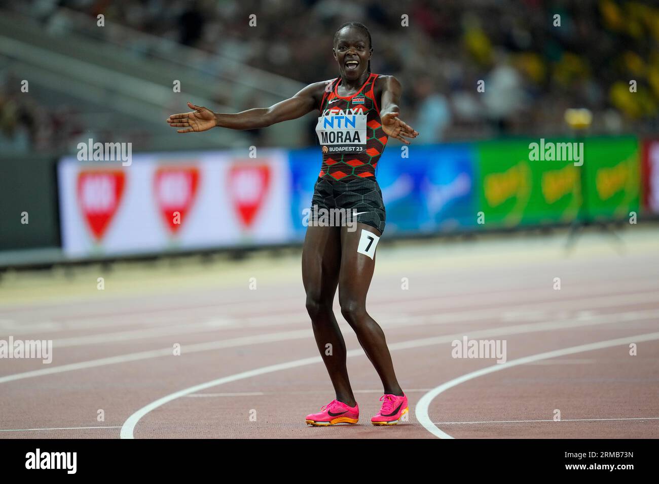Mary Moraa, of Kenya, celebrates after winning the gold medal in the ...