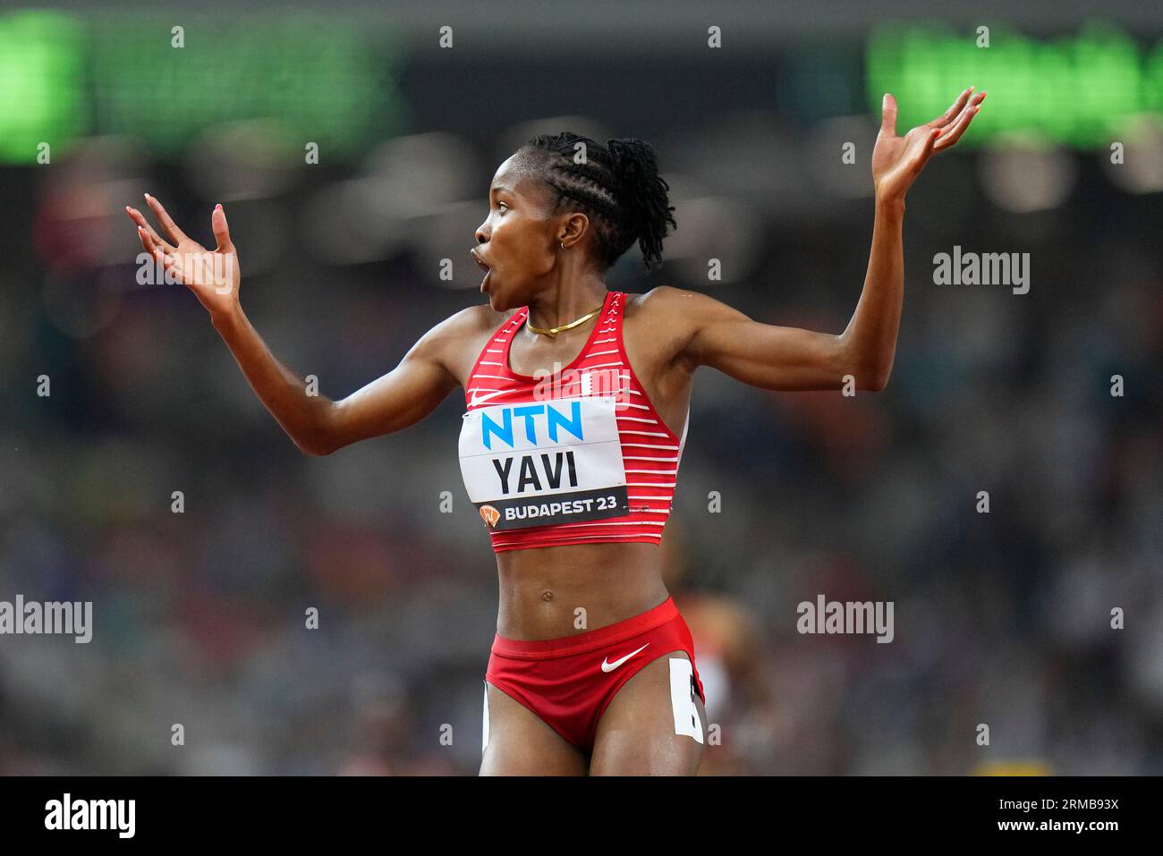 Winfred Mutile Yavi, of Bahrain celebrates after winning the gold medal ...