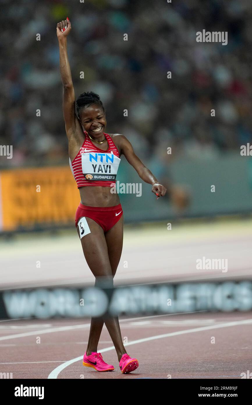 Winfred Mutile Yavi, of Bahrain celebrates after winning the gold medal ...