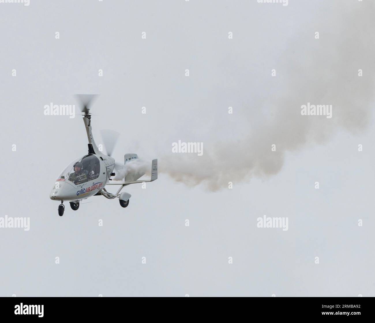 Peter Davis performs a display with his Autogyro, during Rhyl Air Show ...