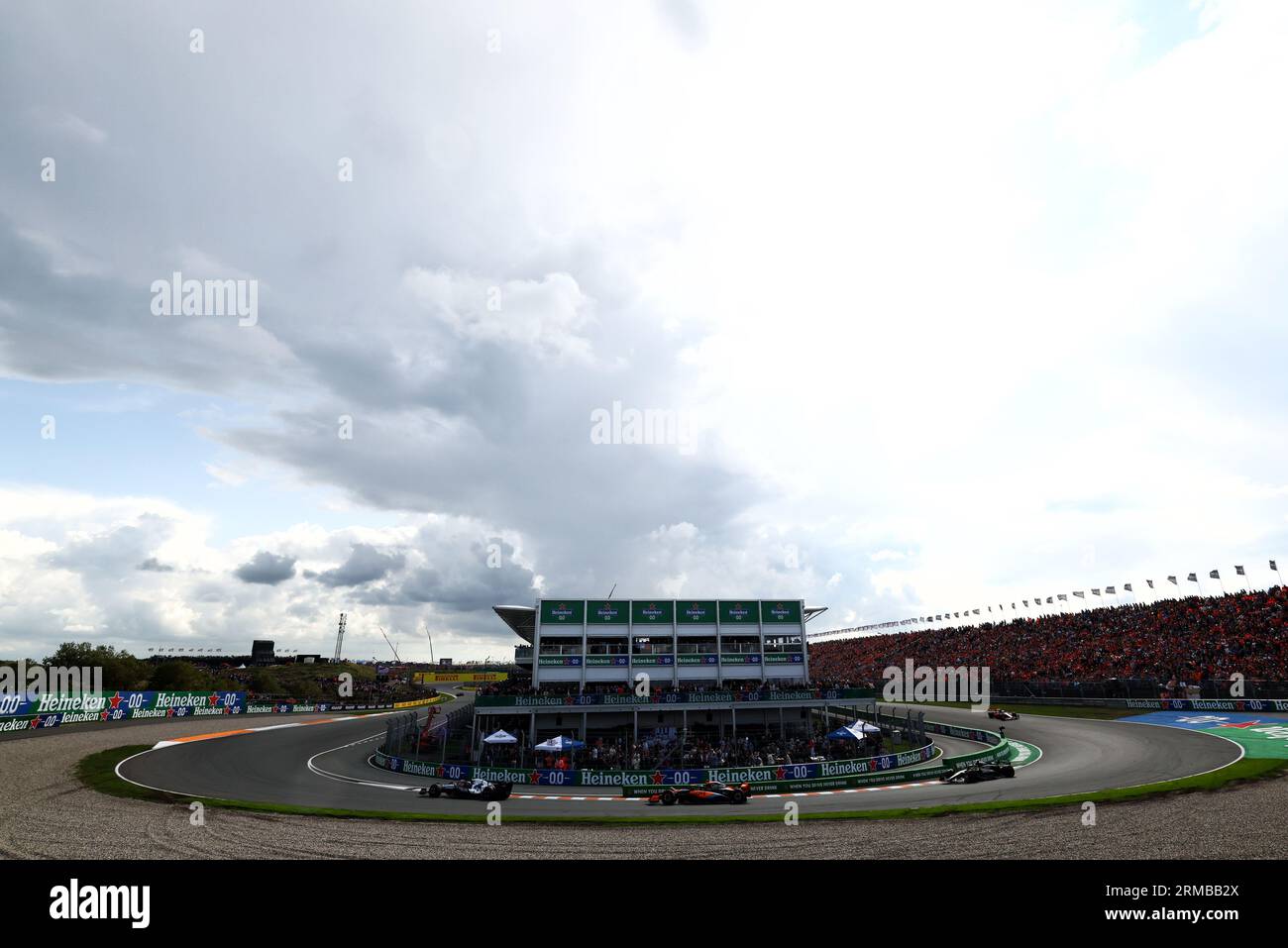Yuki Tsunoda (JPN) AlphaTauri AT04 leads Lando Norris (GBR) McLaren ... Yuki Tsunoda (JPN) AlphaTauri AT04 leads Lando Norris (GBR) McLaren ...