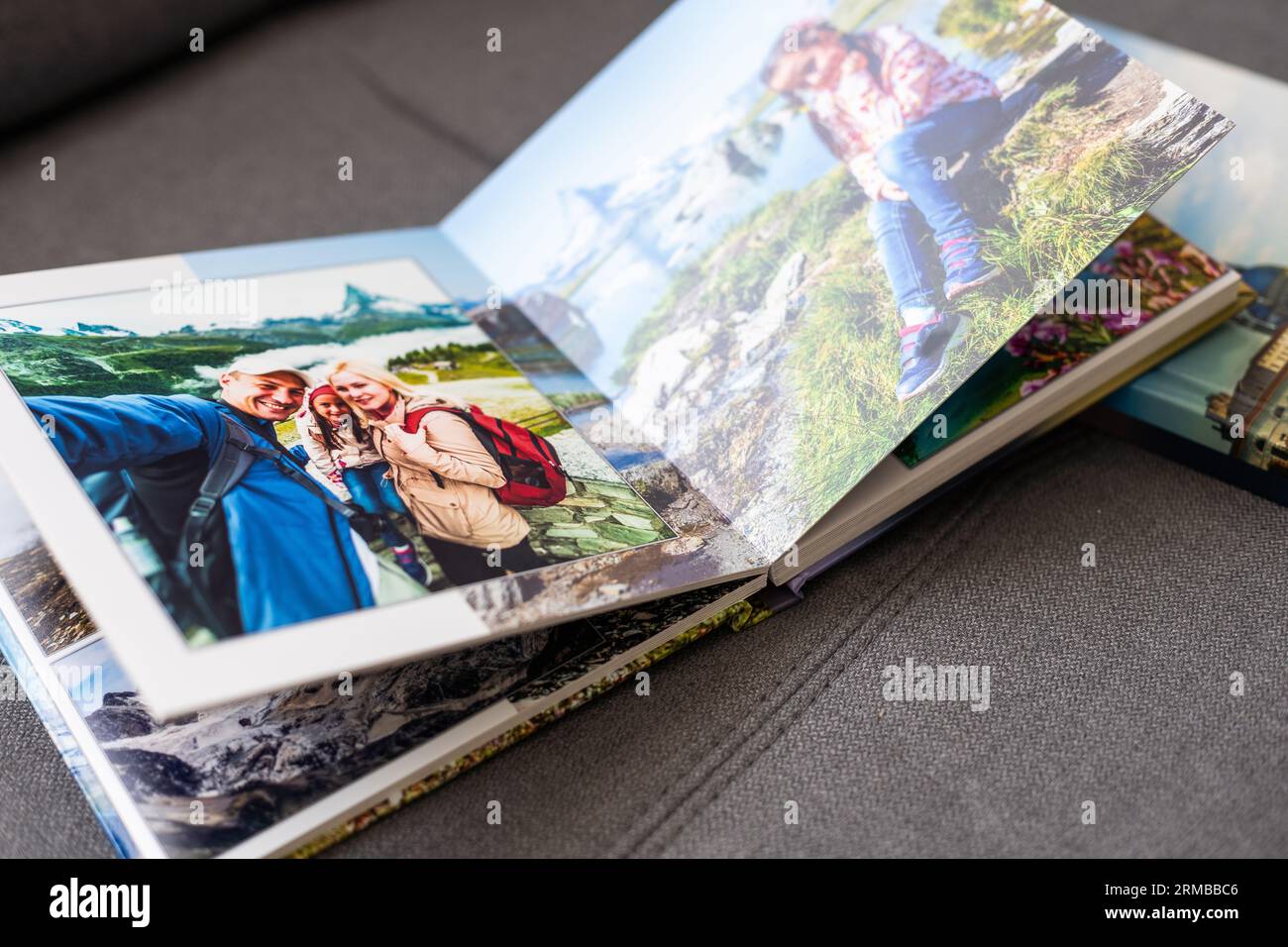close up. photo book binding. storing photos from a photo session in a ...