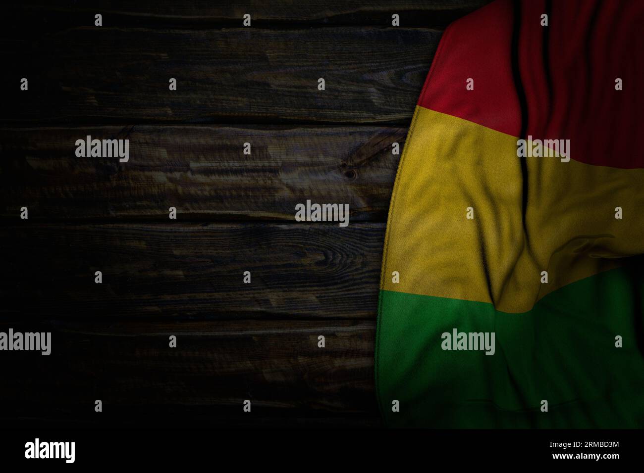 cute dark illustration of Mali flag with large folds on old wood with ...
