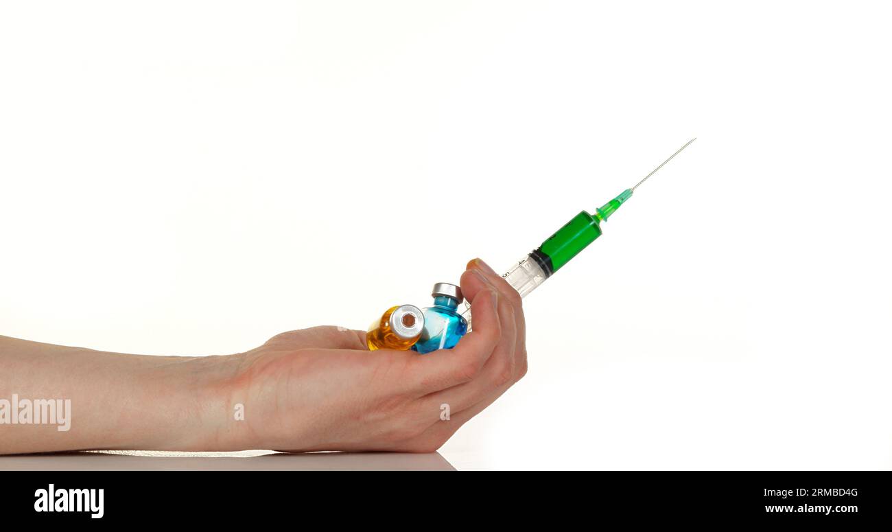 Medical Product Falling into Hand against White Background Stock Photo ...