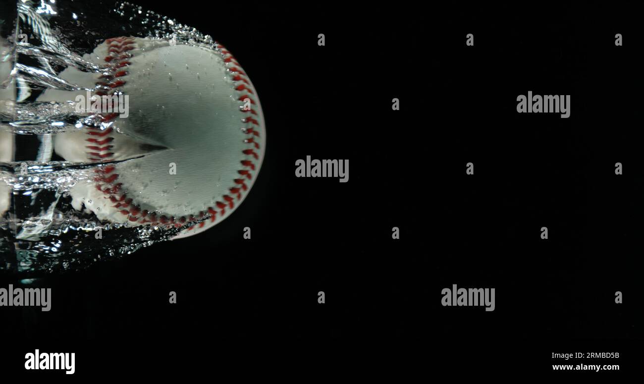 Baseball's Ball Falling into Water against White background Stock Photo ...