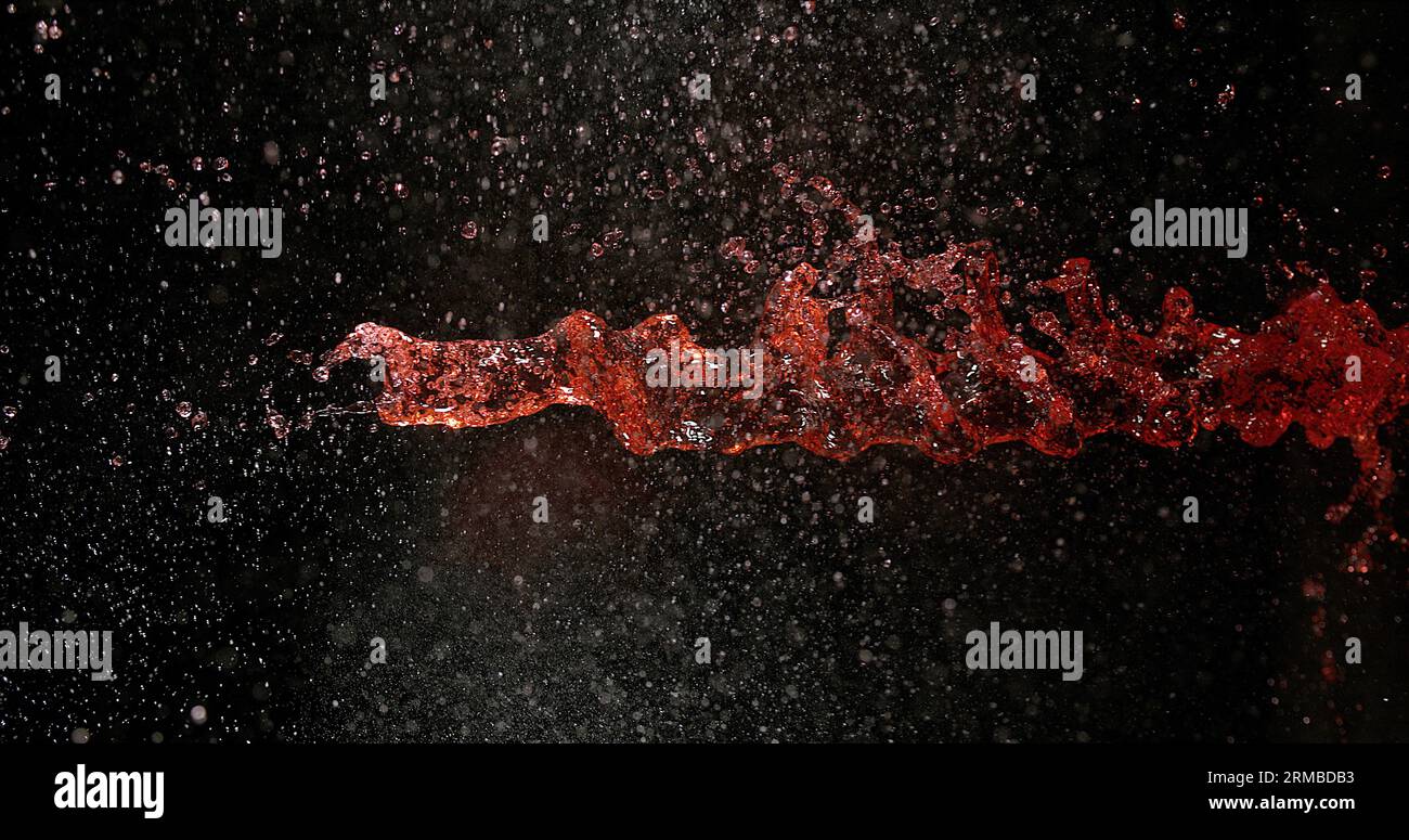 Shot breaking water filled red hi-res stock photography and images - Alamy