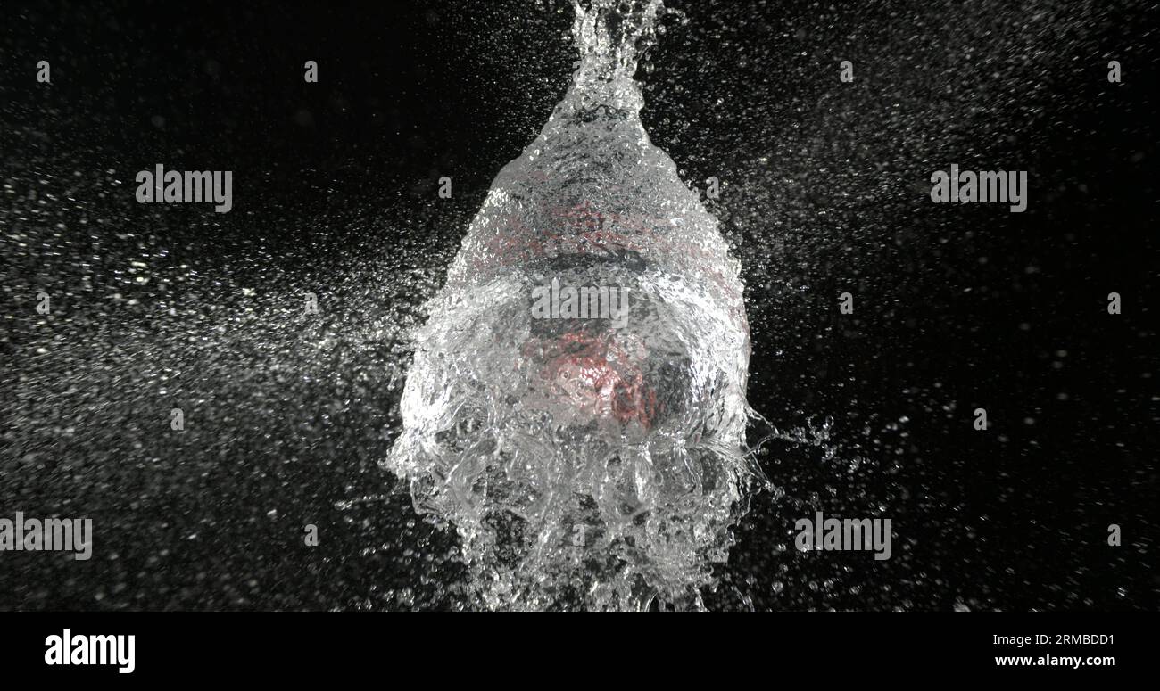 Shot Breaking Water Filled Balloon Stock Photo - Alamy