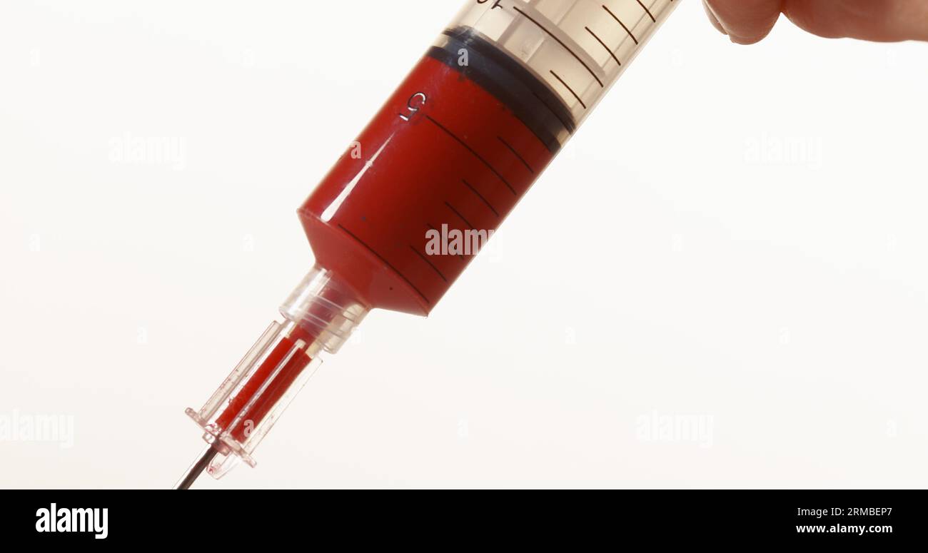 Blood dropping from Needle against White Background Stock Photo - Alamy