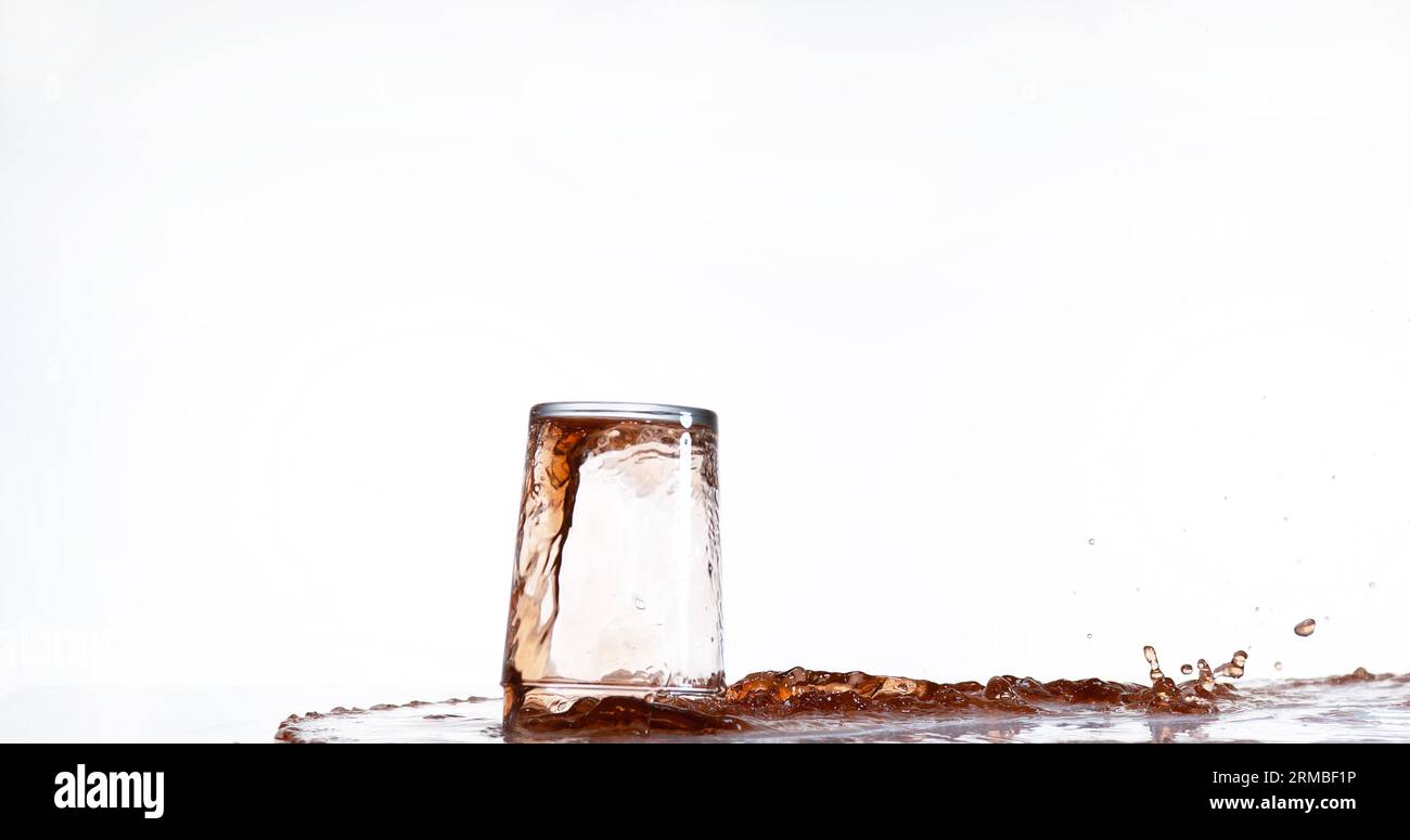 Glass Falling and Red Wine splashing against White Background Stock ...