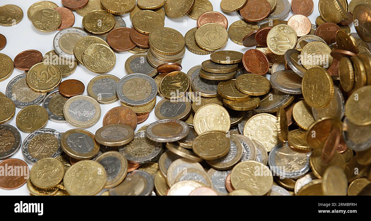 Euro Coins Falling against white Background Stock Photo - Alamy