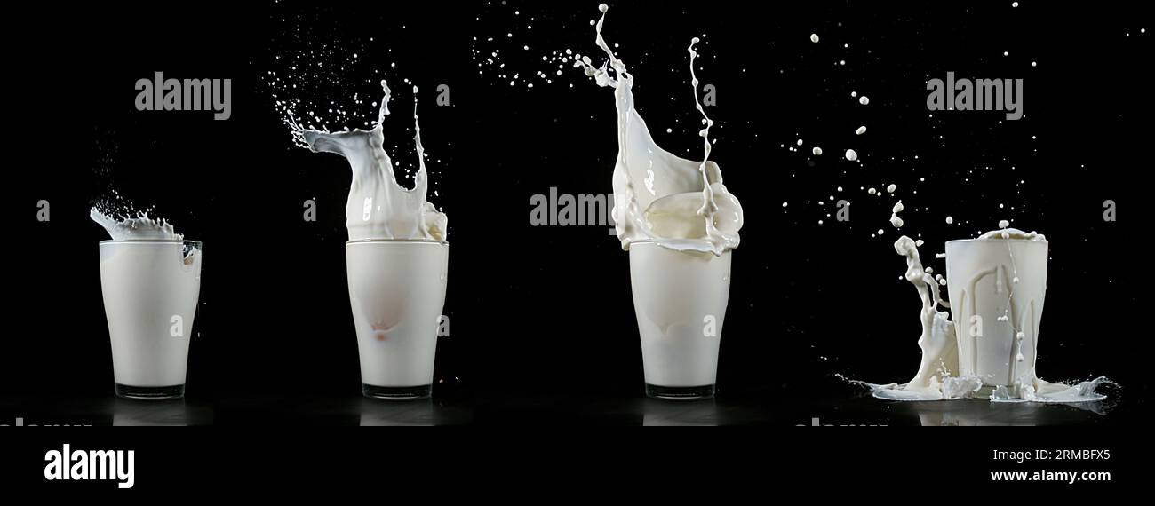Glass of Milk Exploding against White Background Stock Photo - Alamy