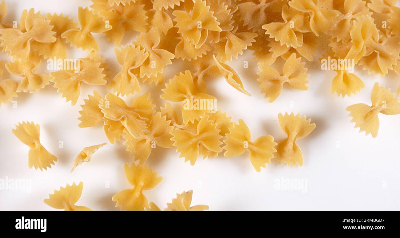 Pasta falling against White Background Stock Photo - Alamy