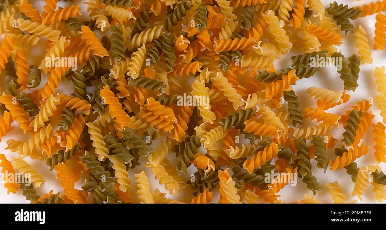 Pasta falling against White Background Stock Photo - Alamy