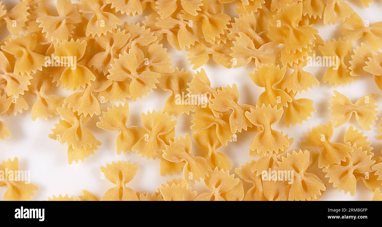 Pasta falling against White Background Stock Photo - Alamy
