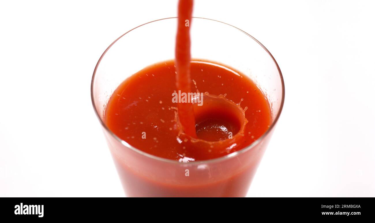 Tomato juice poured glass hi-res stock photography and images - Alamy