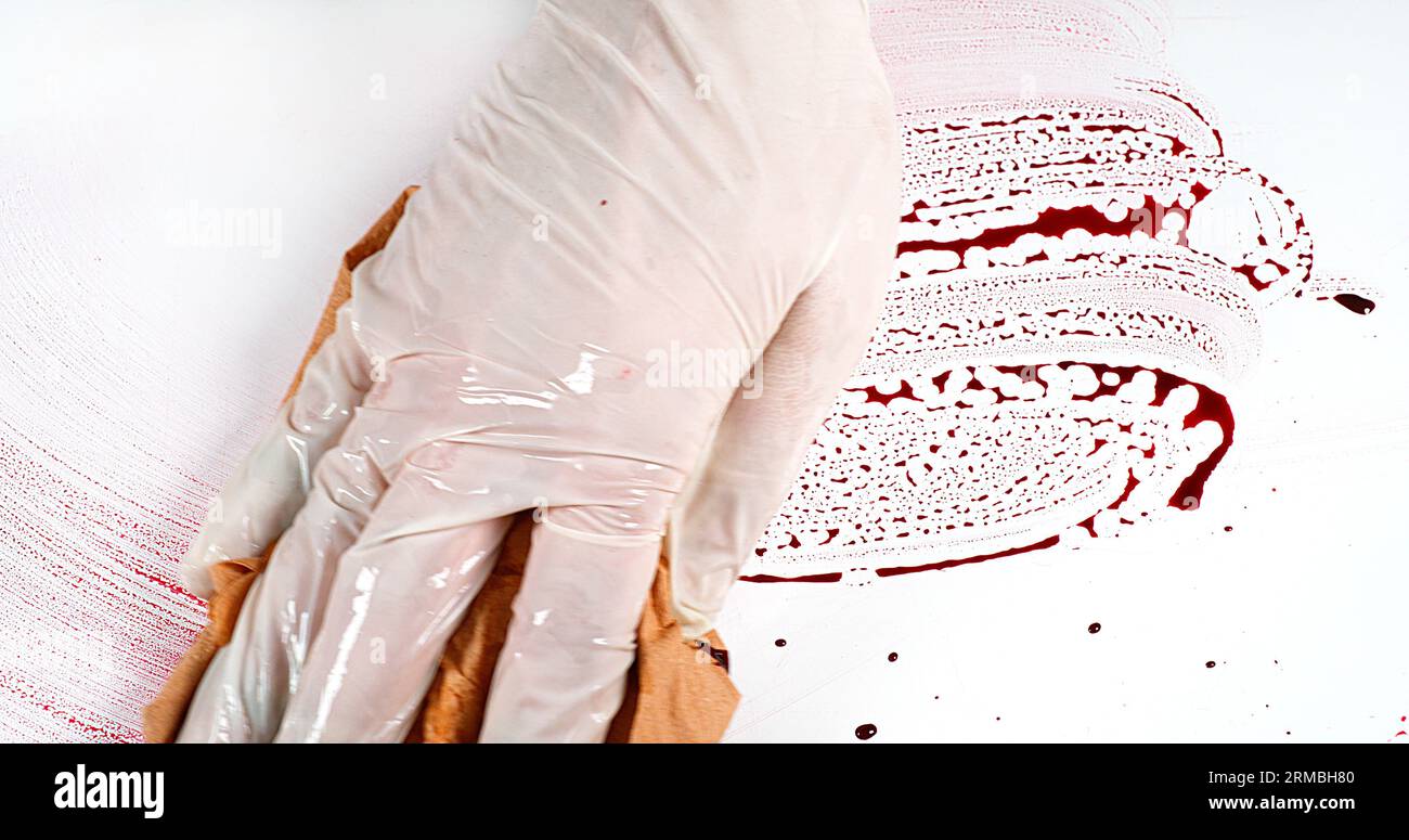 Gloved hand that wipes blood against White Background Stock Photo - Alamy