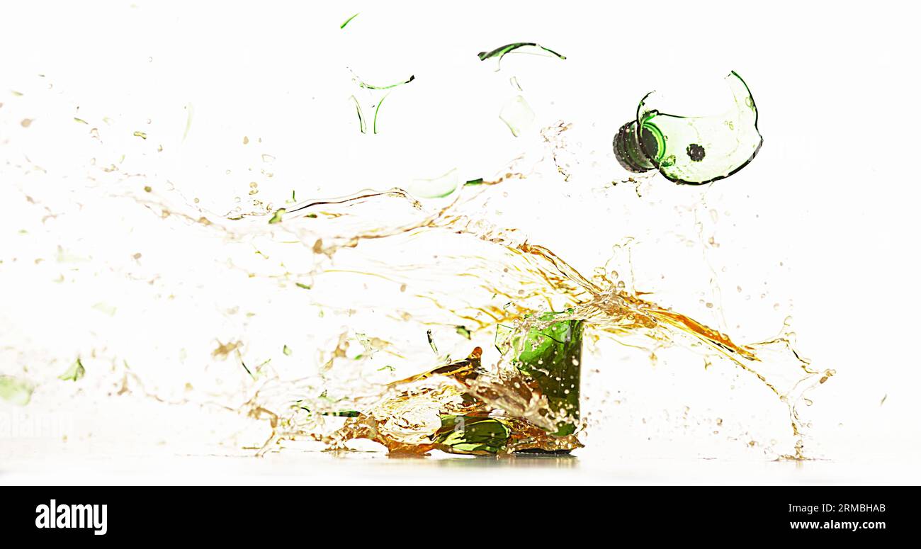Bottle of Beer Breaking and Splashing against White Background Stock ...