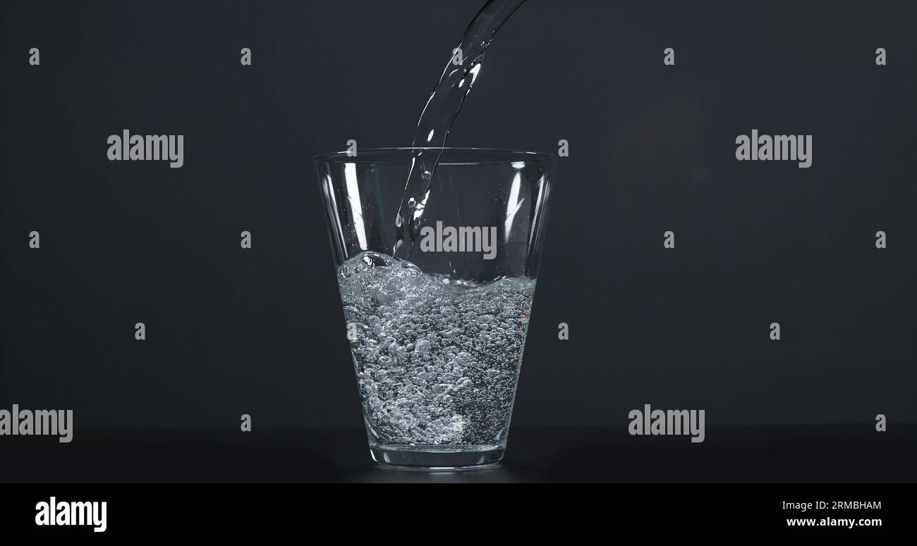 Shot drinking water poured hi-res stock photography and images - Alamy