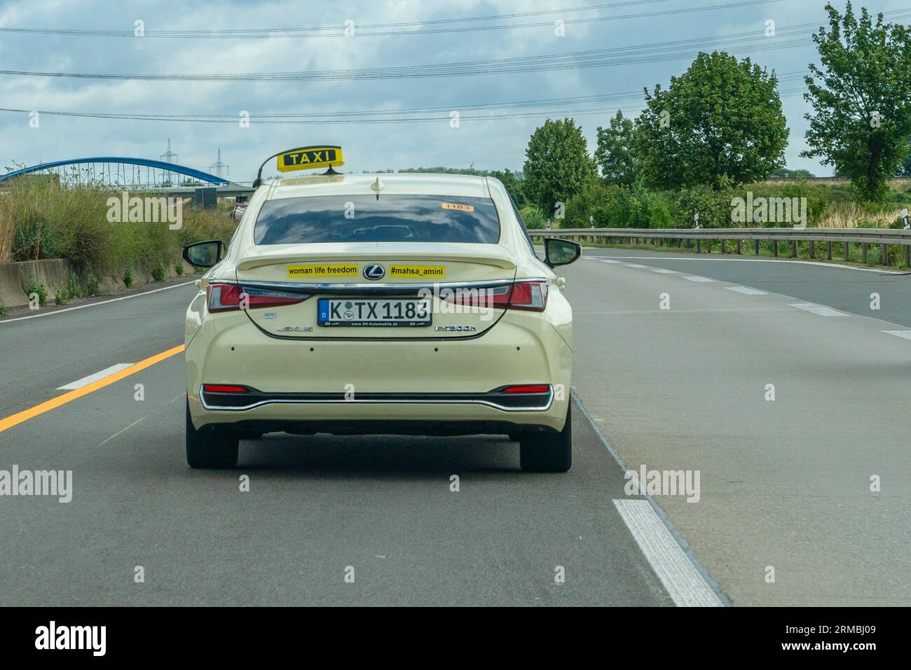 Germany-August 01, 2023: Back rear view of taxi on highway Stock Photo ...