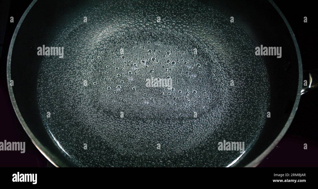 Hot Boiling Water in a saucepan Stock Photo - Alamy