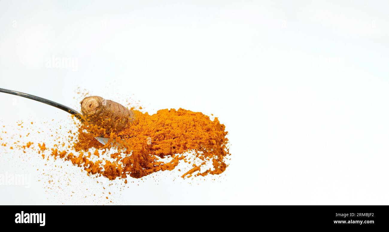 Turmeric, curcuma longa, Root falling on curcuma Powder, Indian Spice ...