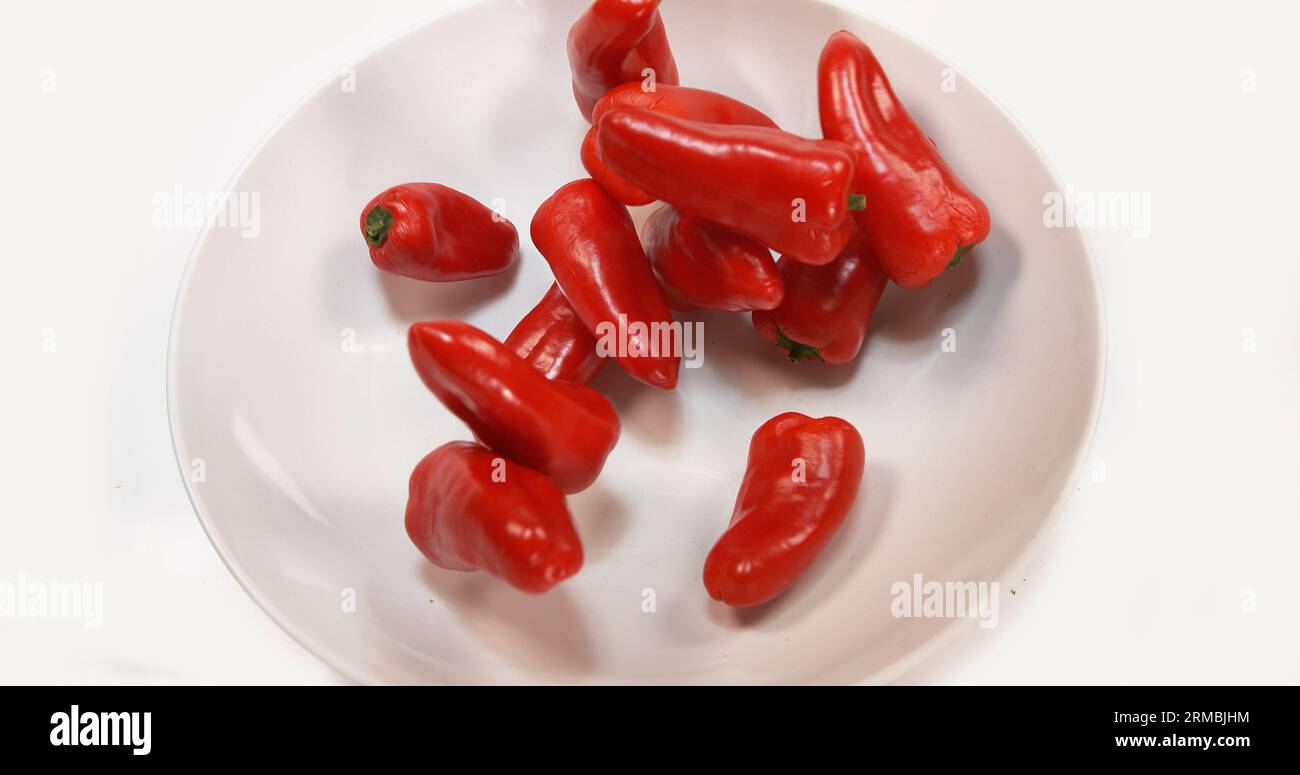 Paprika, capsicum annuum, falling against White Background Stock Photo ...