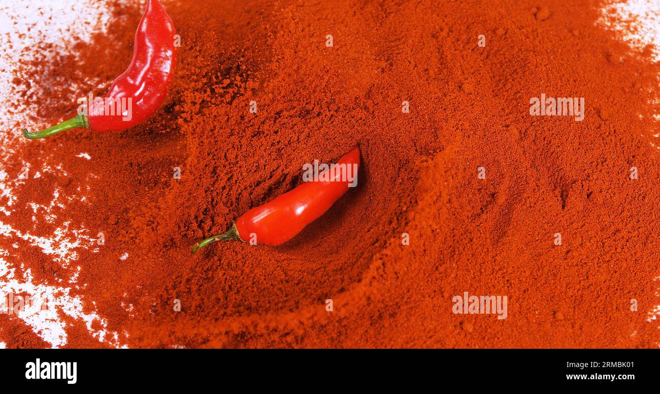 Paprika, capsicum annuum, falling on Paprika Powder Stock Photo - Alamy