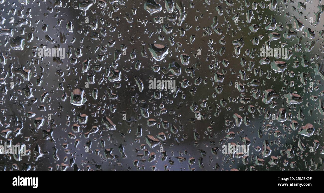 Rain dripping on the windshield of the car hi-res stock photography and ...