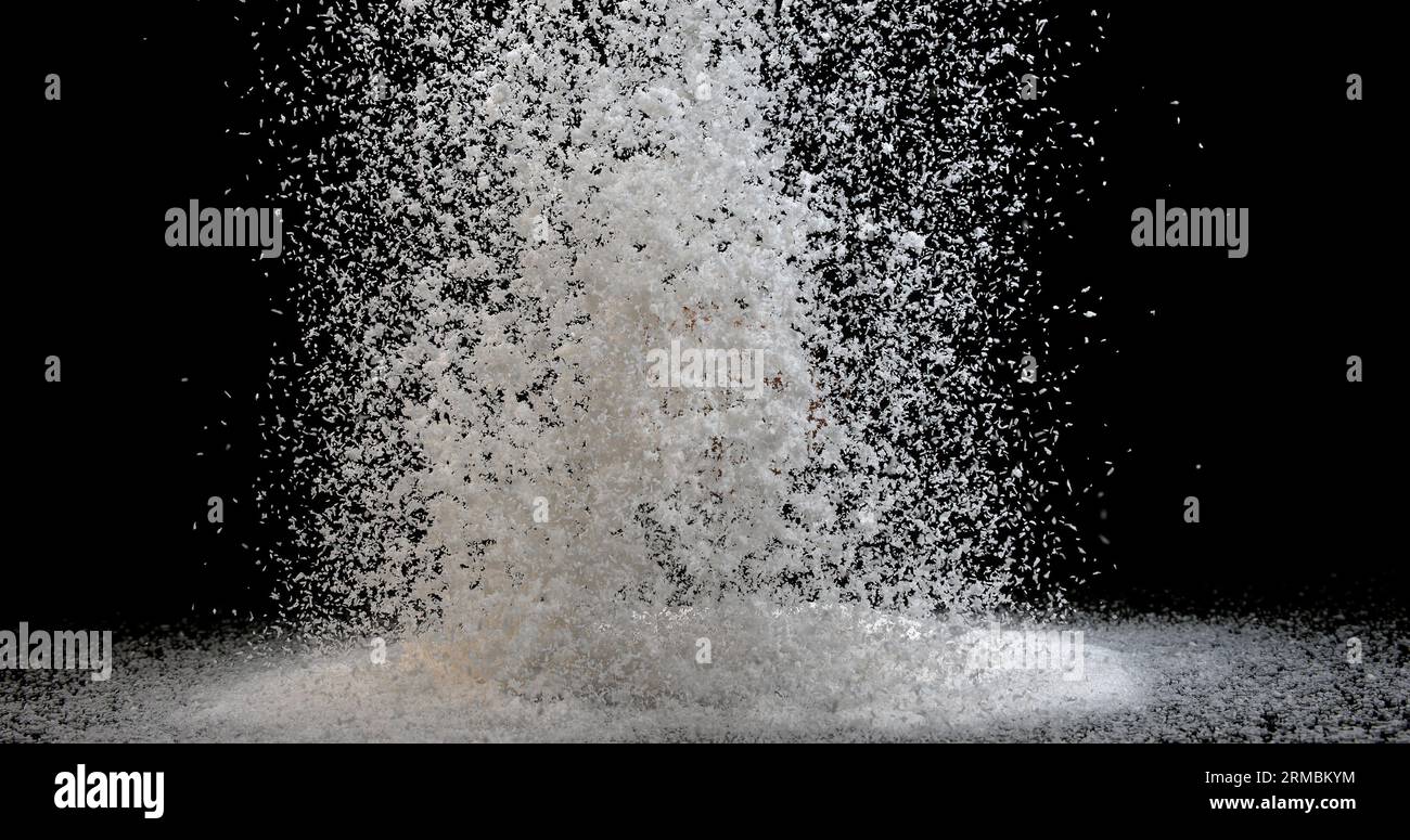 Coconut, cocos nucifera, Powder falling against Black Background Stock ...