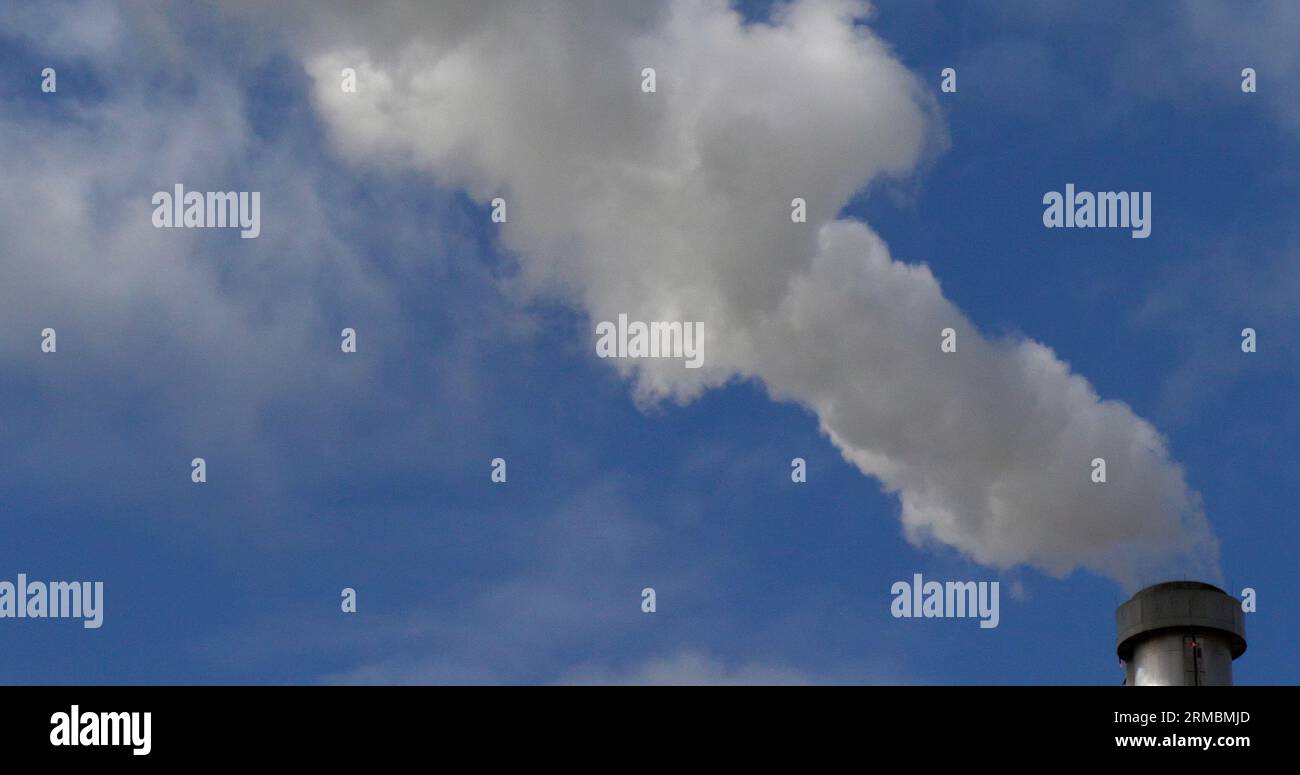 Steam of Water coming out of the Chimney of an Incinerator, Near Paris ...