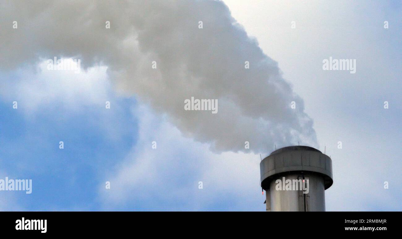 Steam of Water coming out of the Chimney of an Incinerator, Near Paris ...