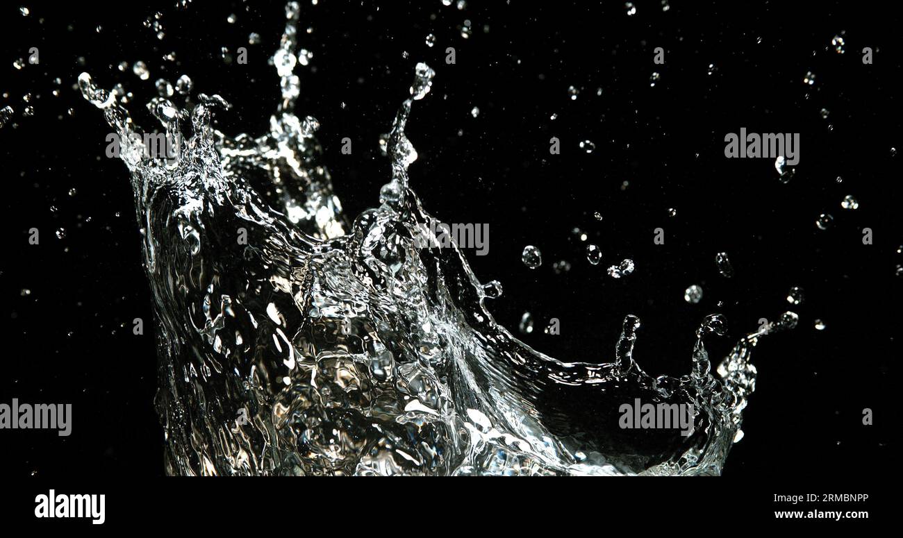 Water Exploding and Splashing against Black Background Stock Photo - Alamy