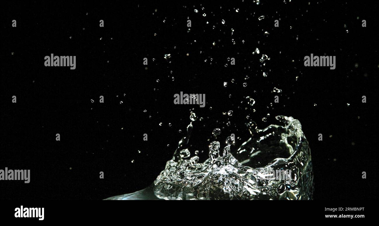 Water Exploding and Splashing against Black Background Stock Photo - Alamy