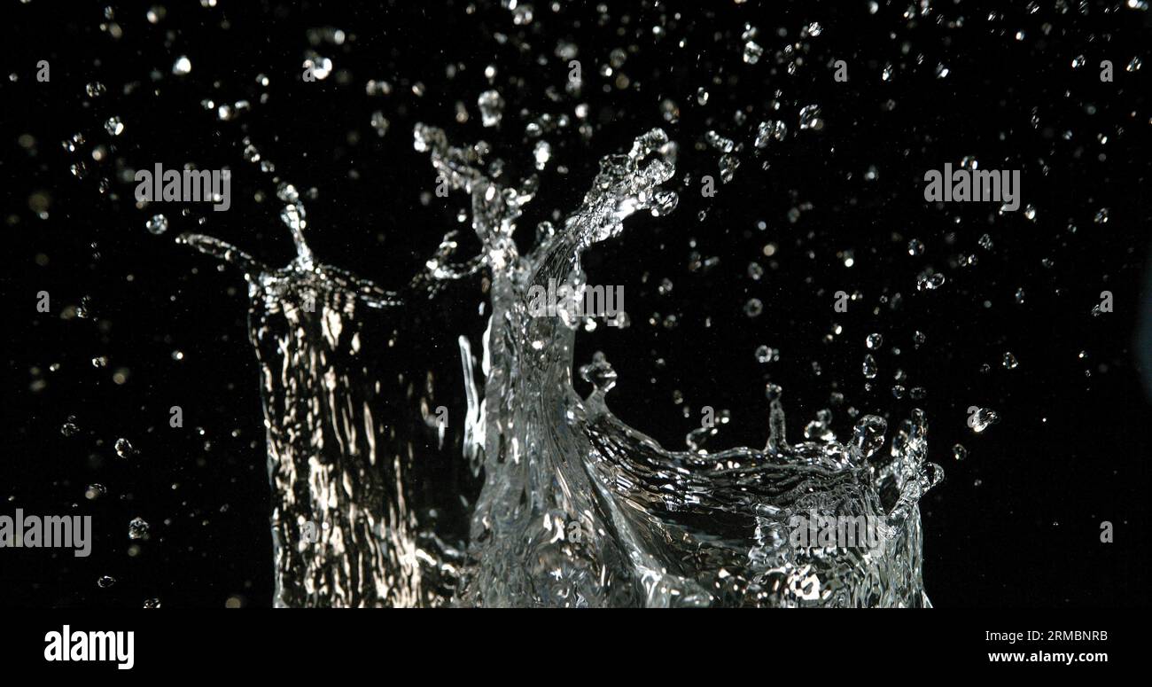 Water Exploding and Splashing against Black Background Stock Photo - Alamy