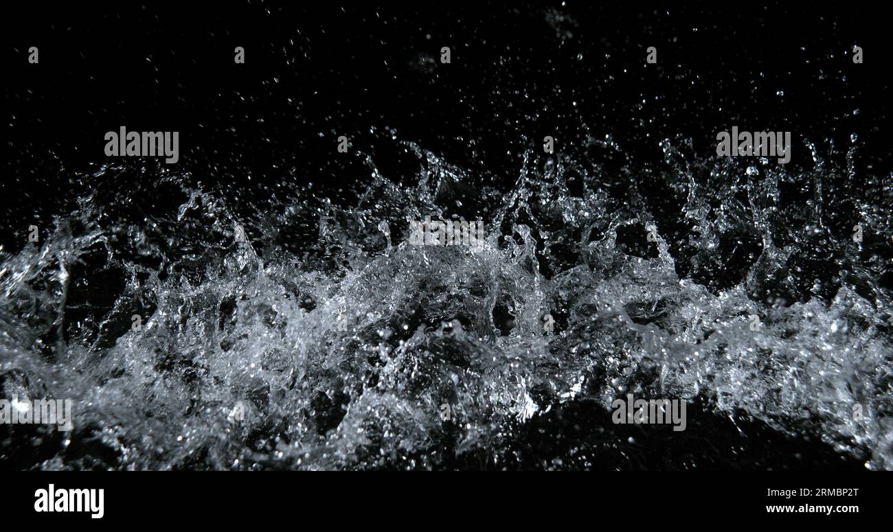 Water Exploding and Splashing against Black Background Stock Photo - Alamy