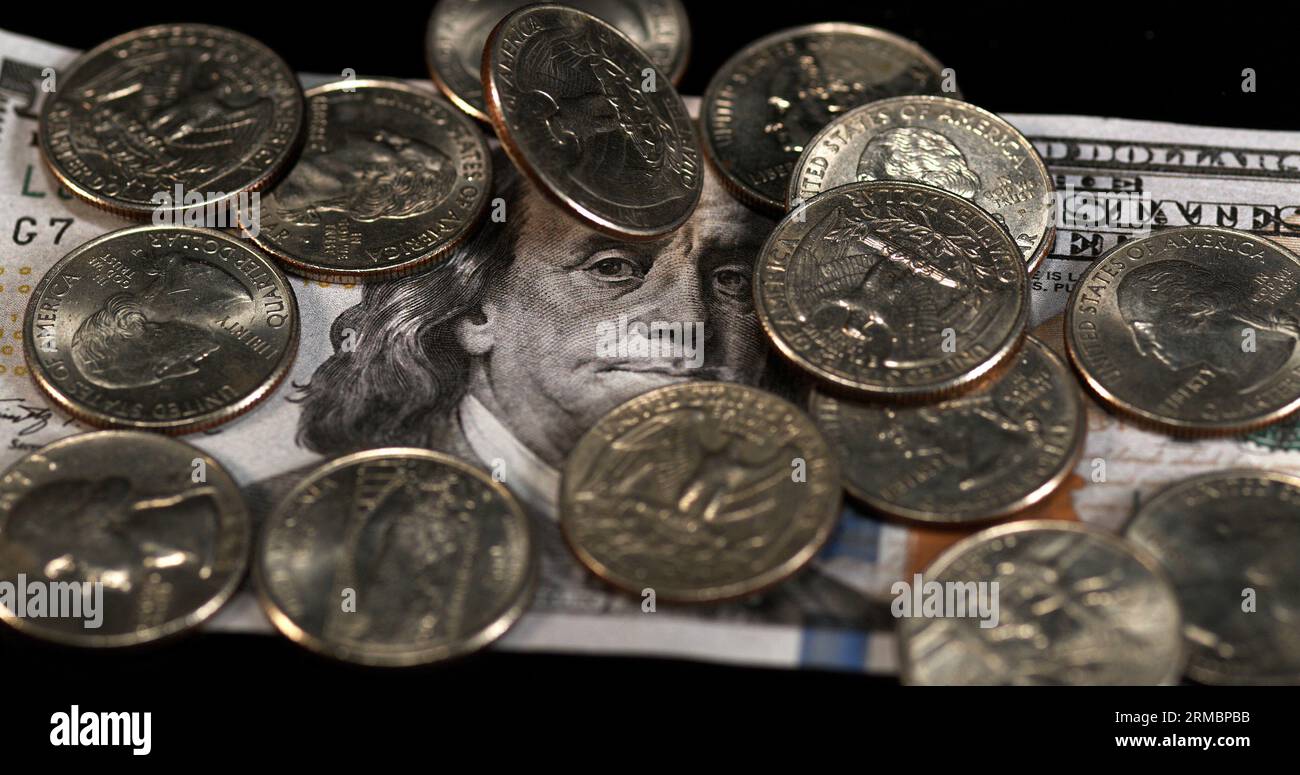 Quarter Dollar Coins Falling, Rolling and Sliding on Black Background ...
