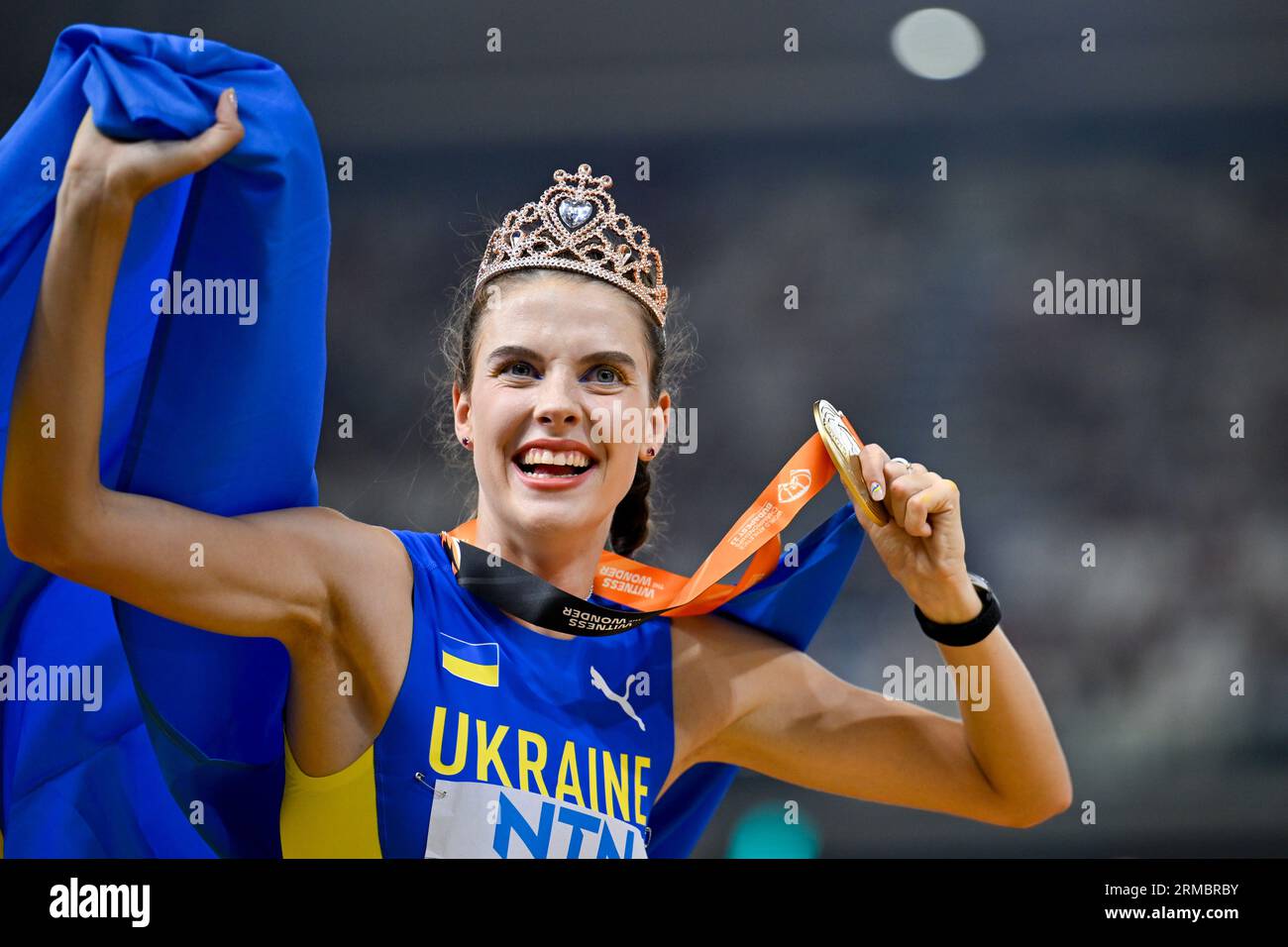 Yaroslava Mahuchikh, of Ukraine, celebrates after winning the gold ...