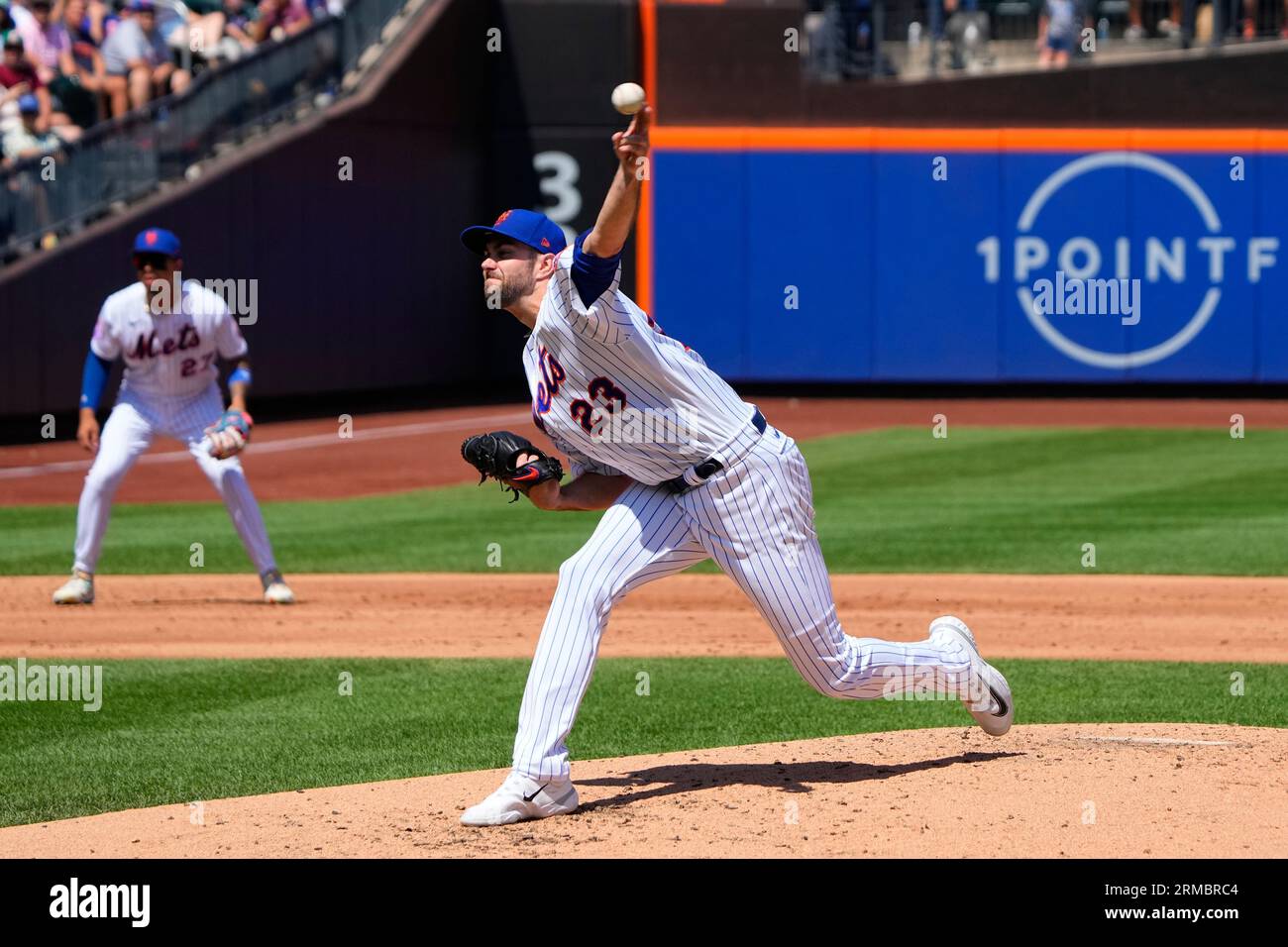 FLUSHING, NY - AUGUST 27: New York Mets Pitcher David Peterson (23) delivers a pitch during the ...