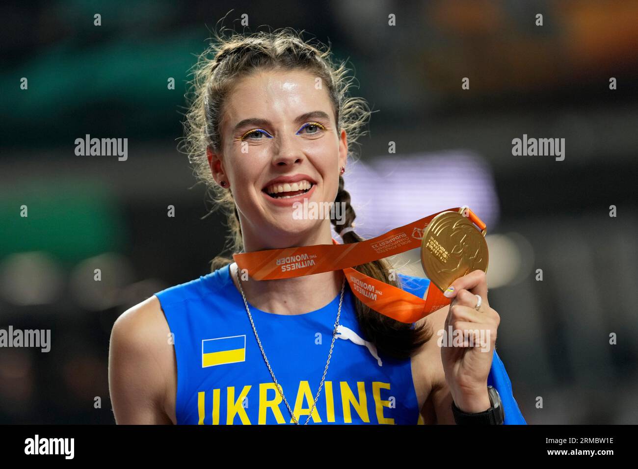 Yaroslava Mahuchikh, of Ukraine, poses after winning the gold medal in ...