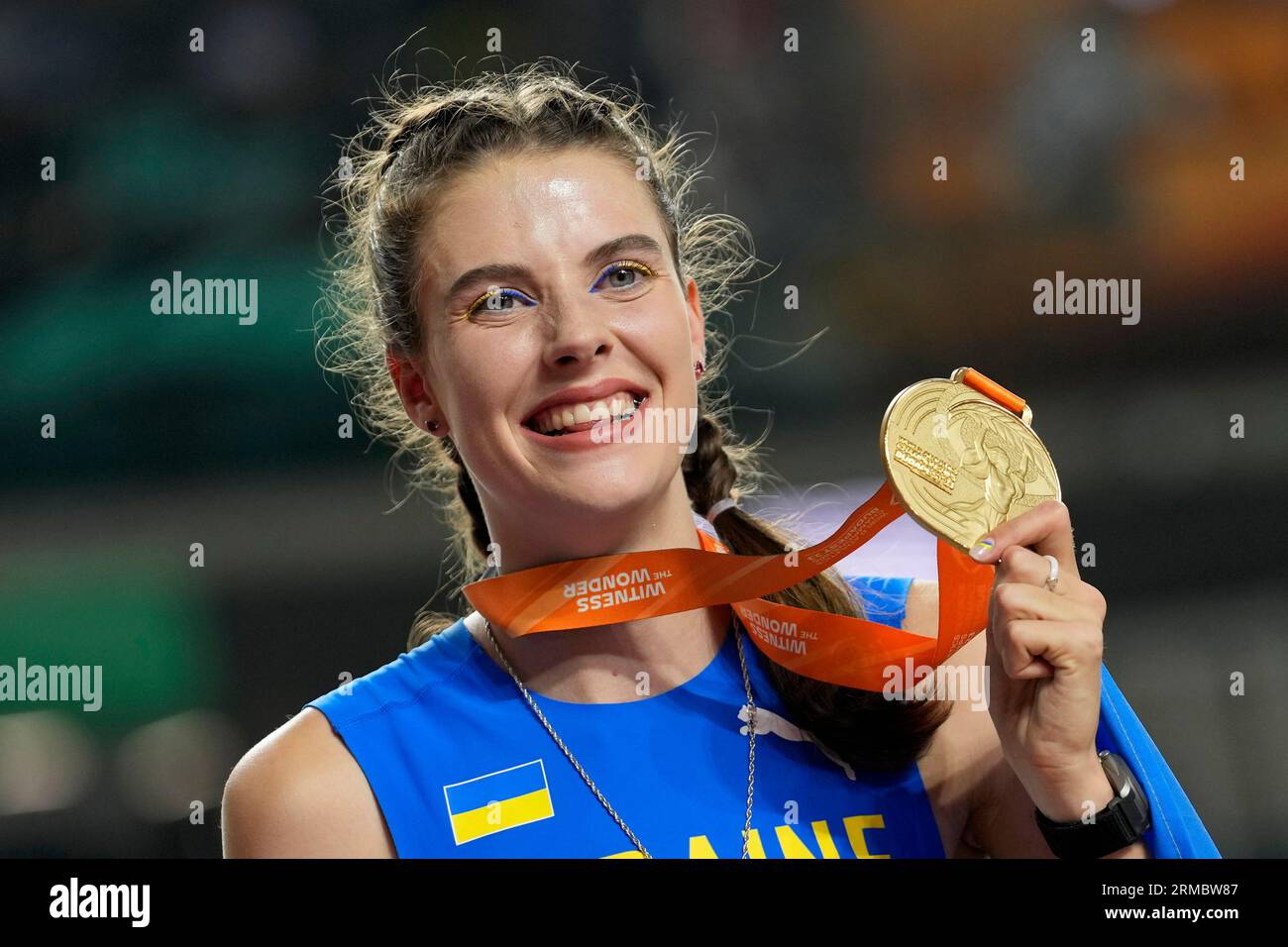 Yaroslava Mahuchikh, of Ukraine, poses after winning the gold medal in ...