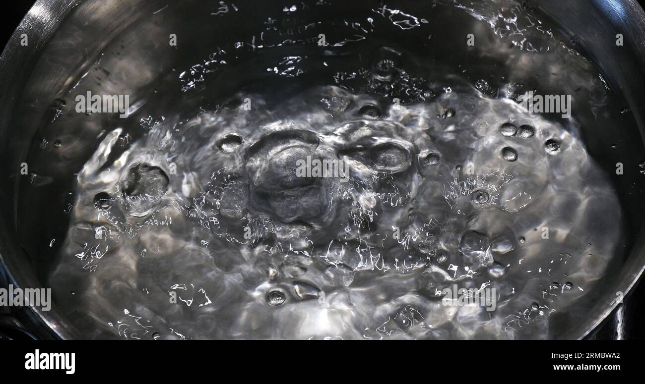 Hot Boiling Water in a saucepan Stock Photo - Alamy
