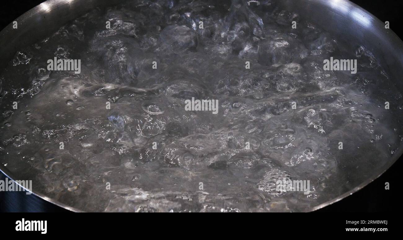Hot Boiling Water in a saucepan Stock Photo - Alamy