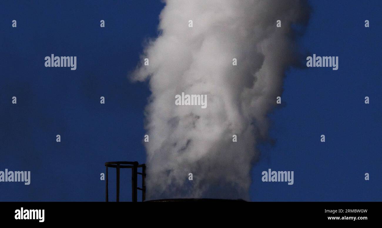 Smokestack of Sugar Refinery with Water Vapour, Near Caen in Normandy ...