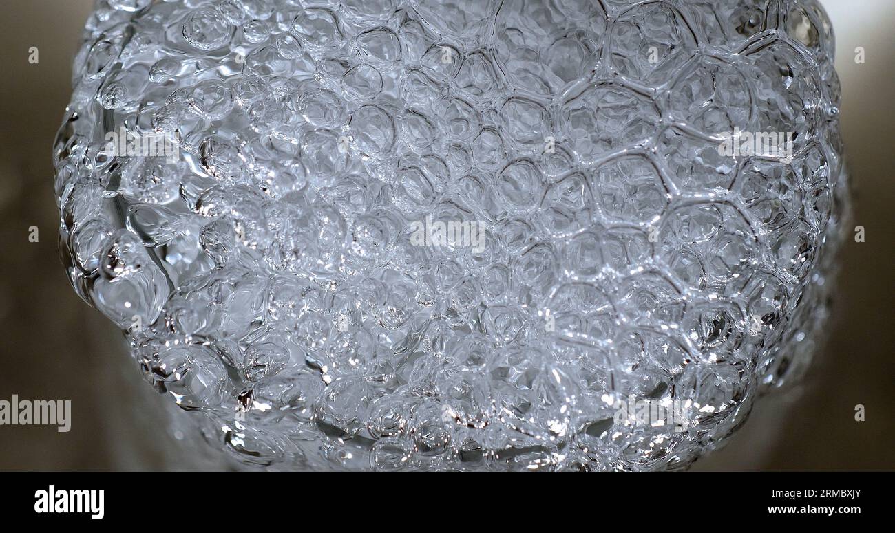Pouring water from a tap into a glass hi-res stock photography and images - Alamy
