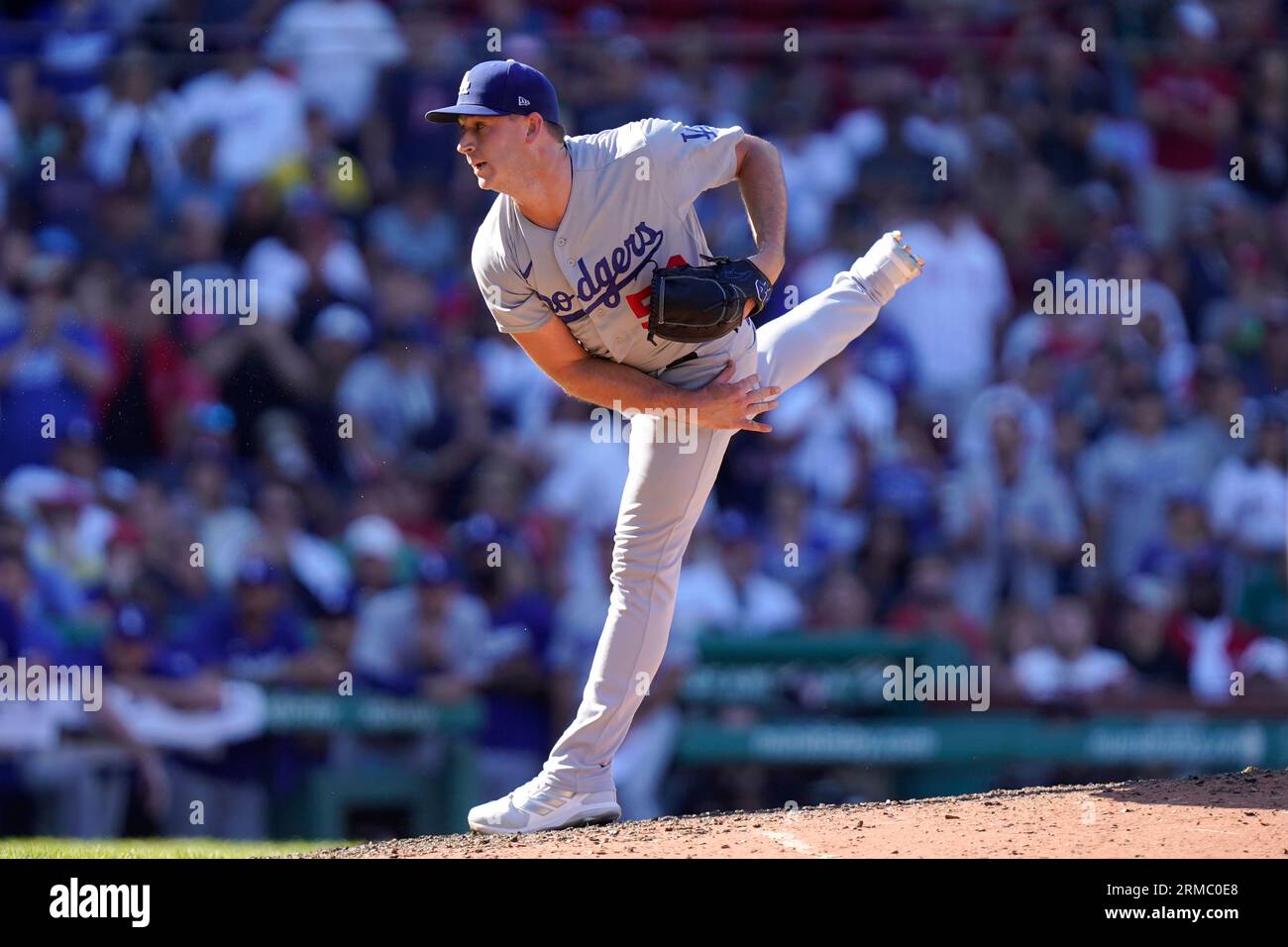 Los Angeles Dodgers' Evan Phillips delivers a pitch to a Boston Red Sox ...